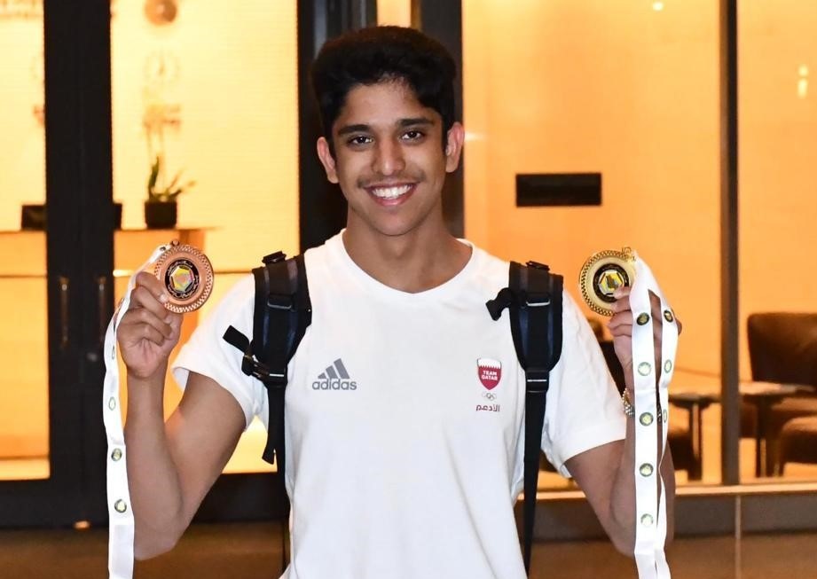 ILoveQatar.net | Abdulaziz Al Obaidly: Qatar's no. 1 teenage swimming ...
